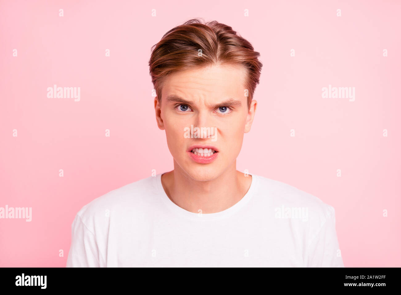 Good-dressed man look at camera angry show white tooth teeth iso Stock ...