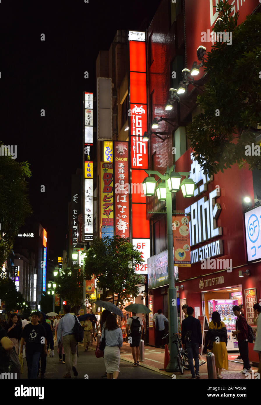 People walking street umbrellas tokyo hi-res stock photography and ...