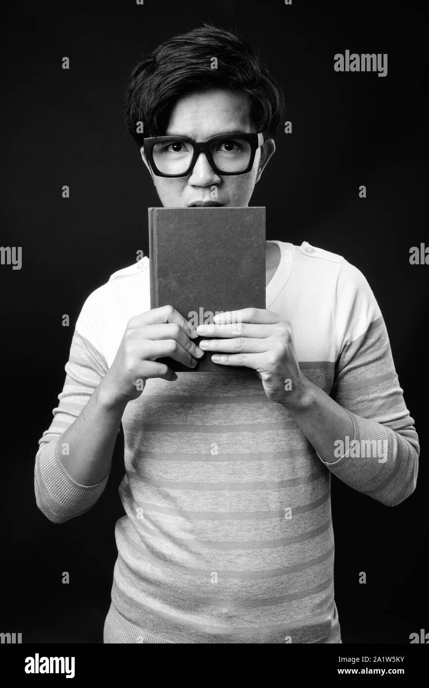 Black male student book Black and White Stock Photos & Images - Alamy