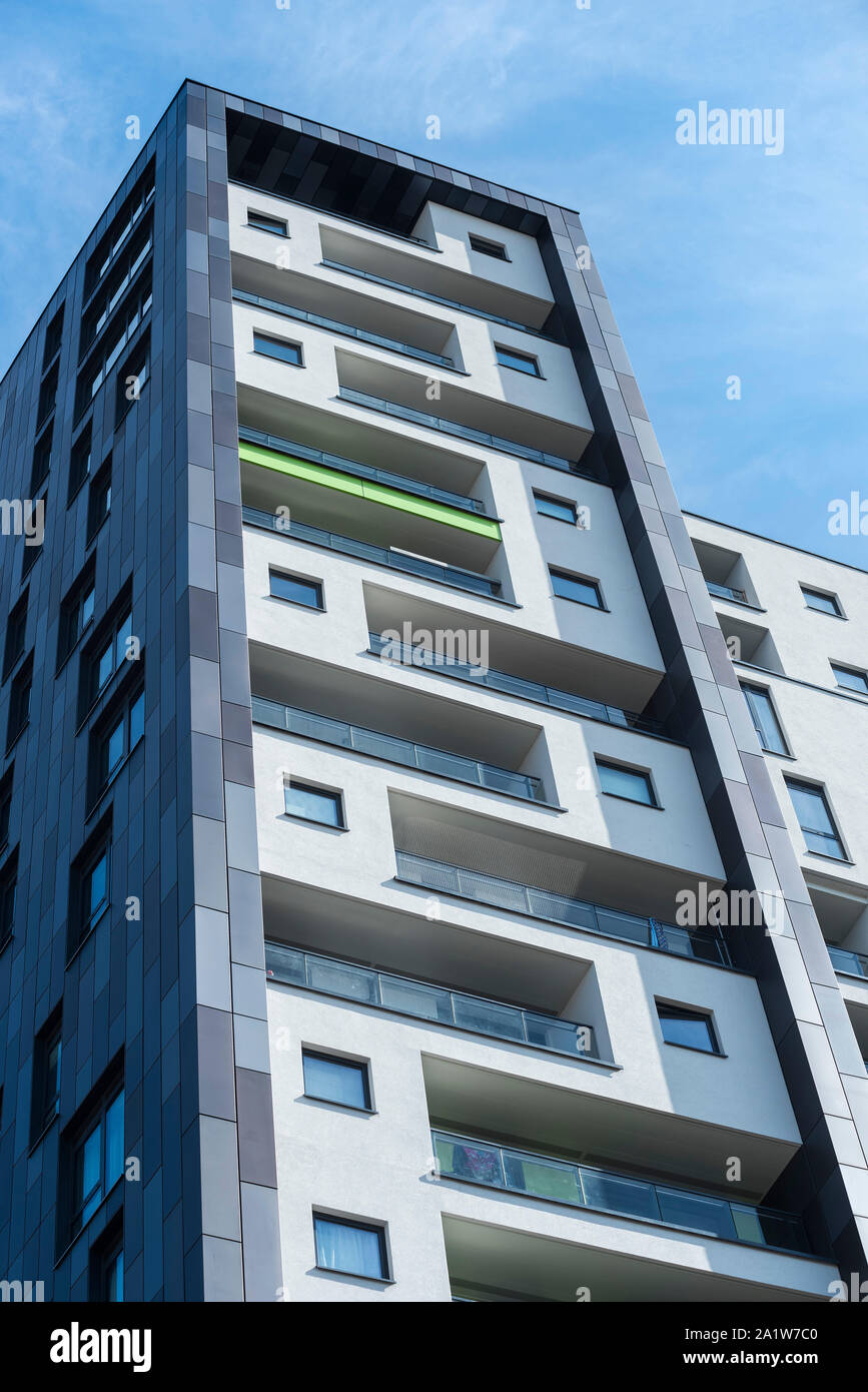 Modern architecture apartment tower block with bright green colored ...