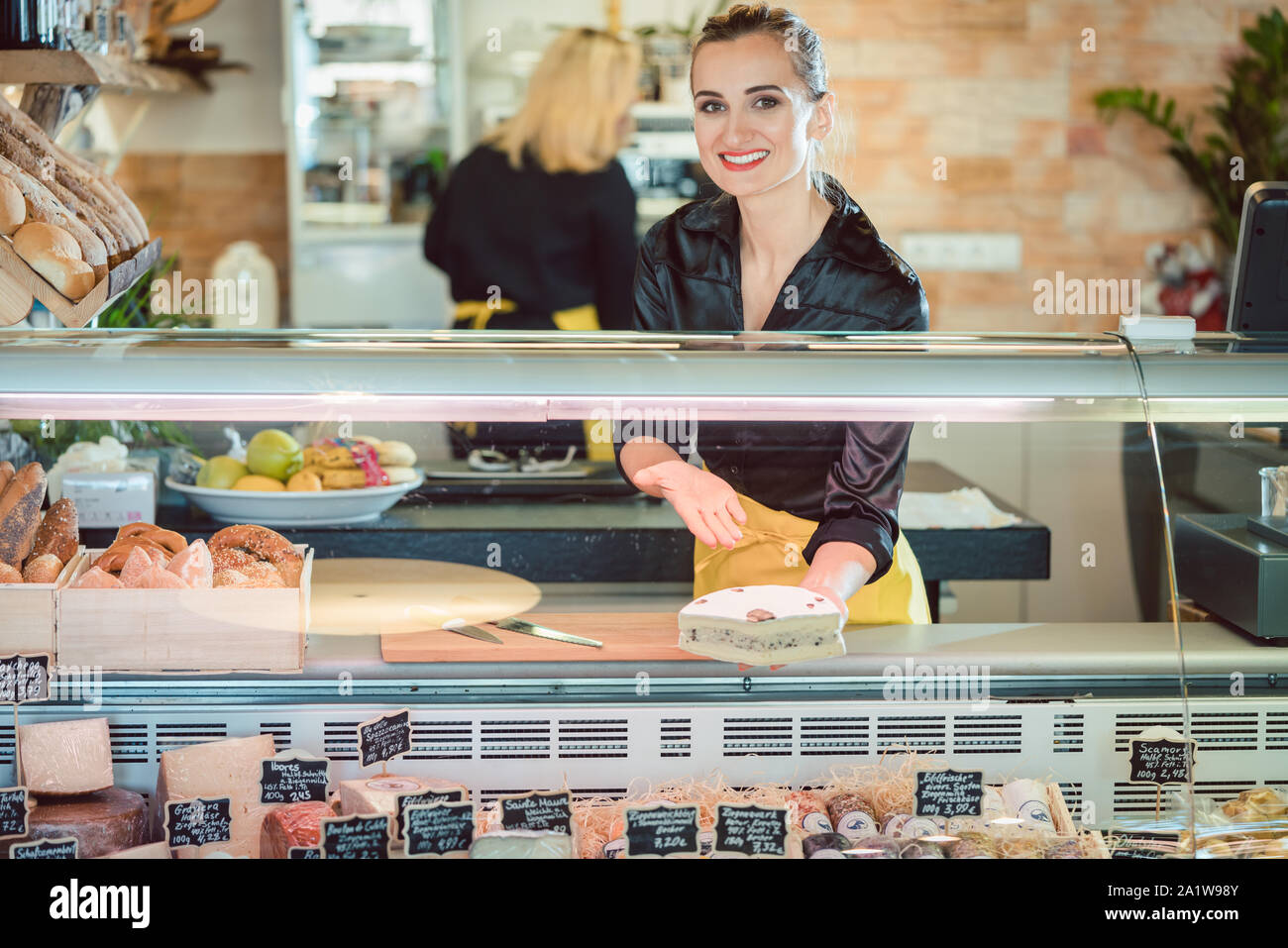 Supermarket deli worker hi-res stock photography and images - Alamy