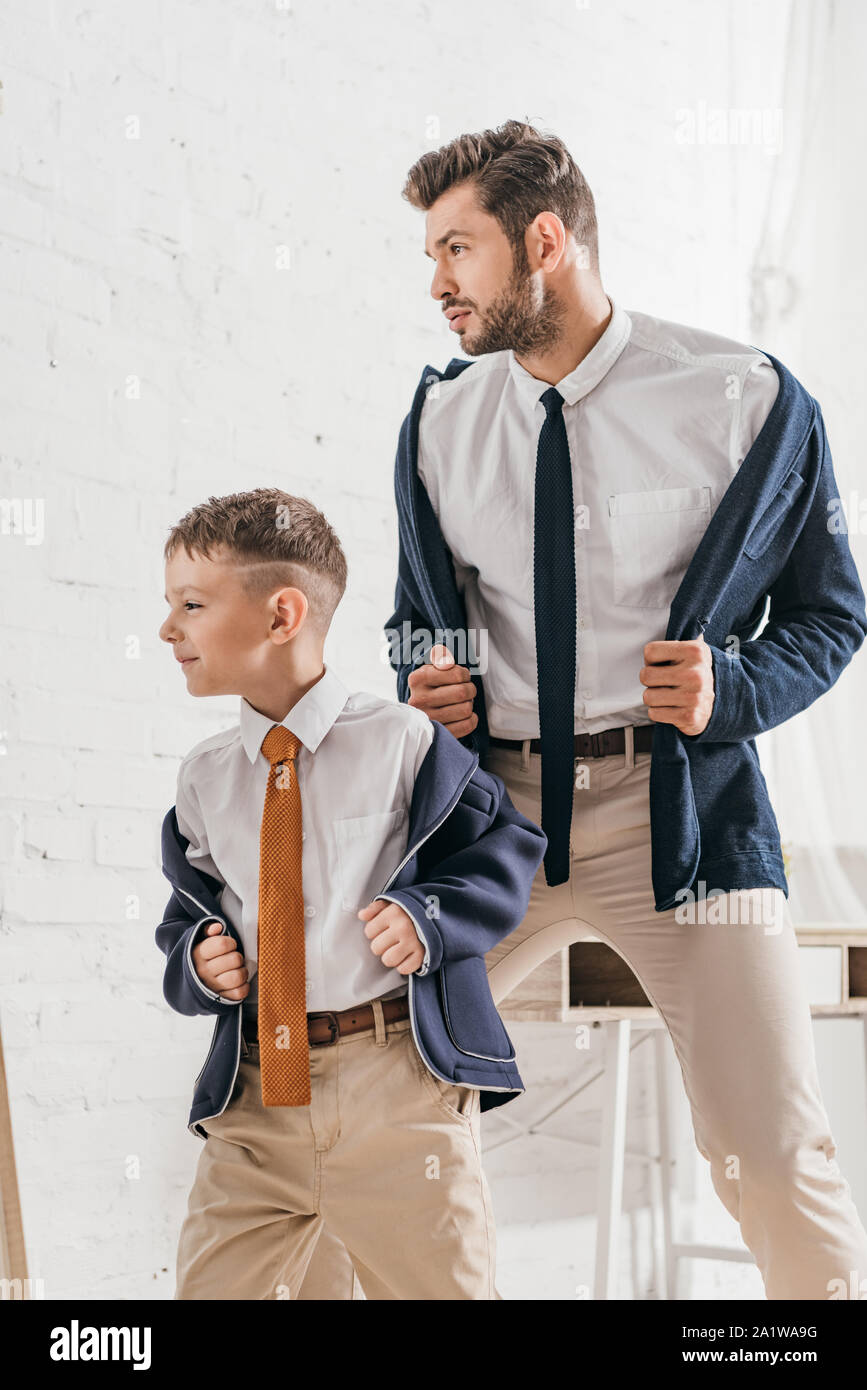 confident dad and son in formal wear at home Stock Photo - Alamy