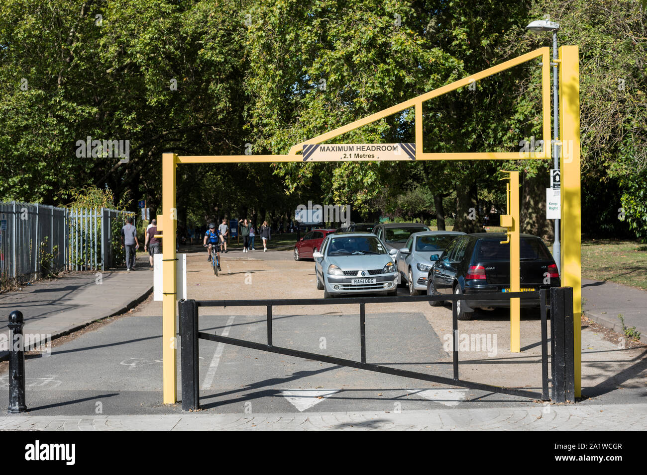 Yellow 2.1 metres restricted height metal barrier and gate preventing ...