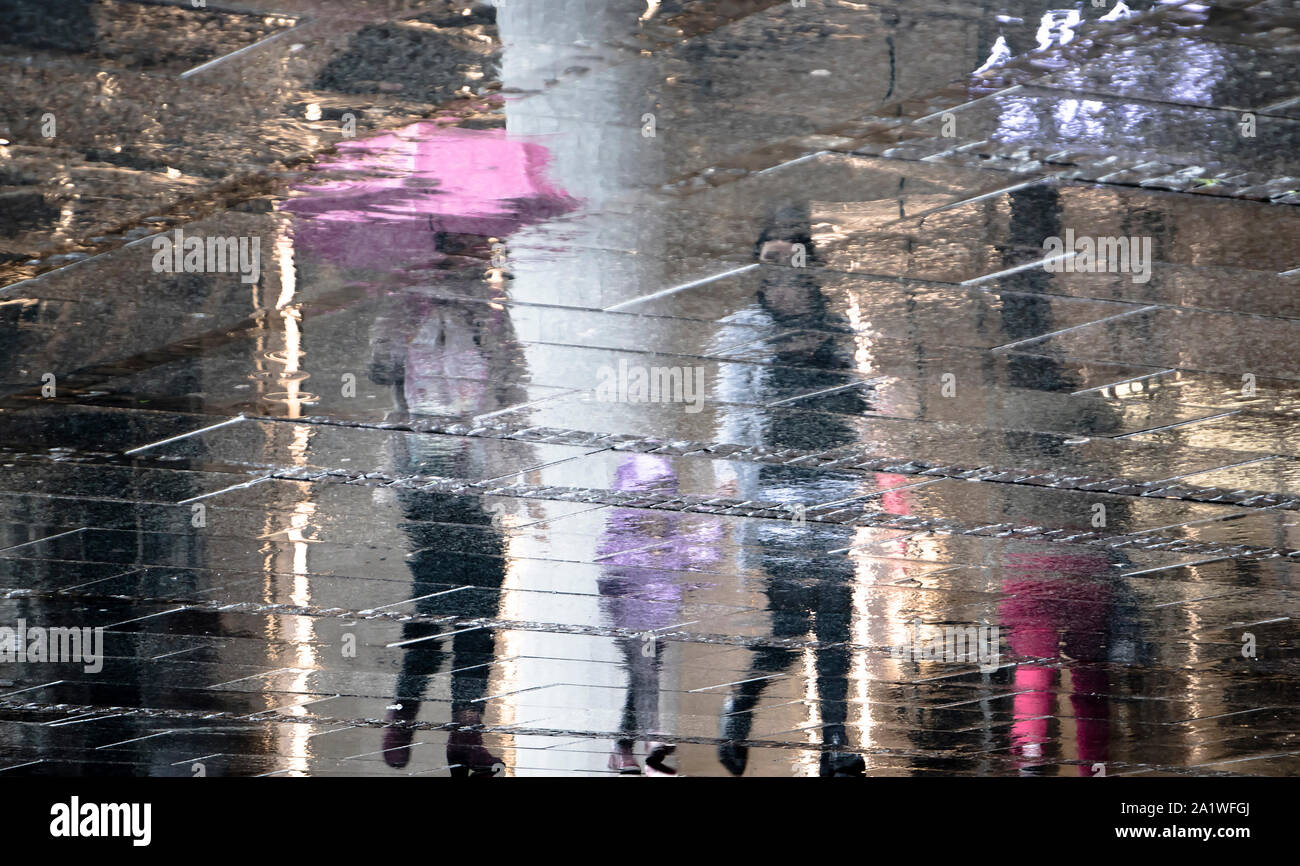 Walking child shadow umbrella hi-res stock photography and images - Alamy