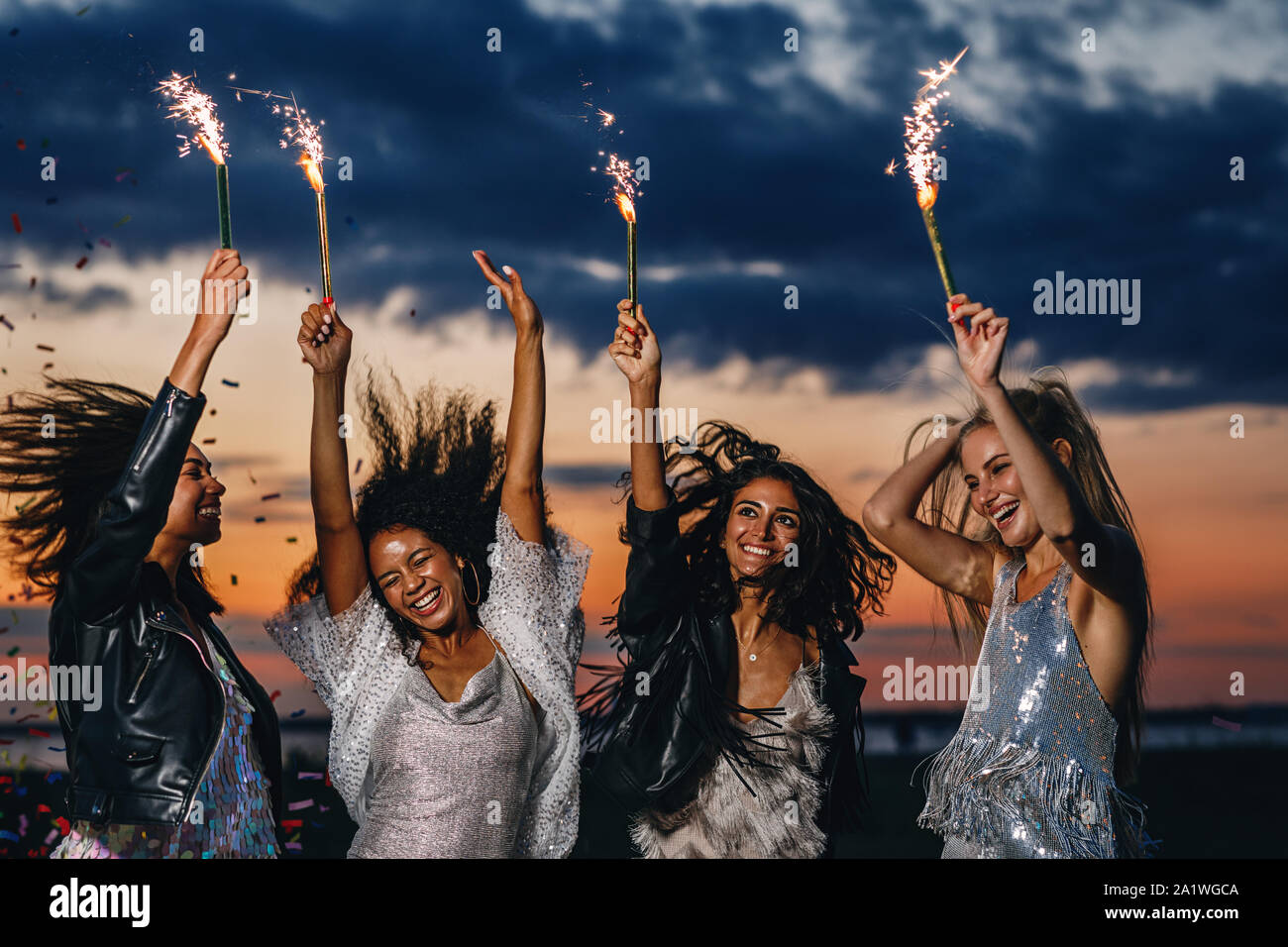 Women dancing sparklers hi-res stock photography and images - Alamy