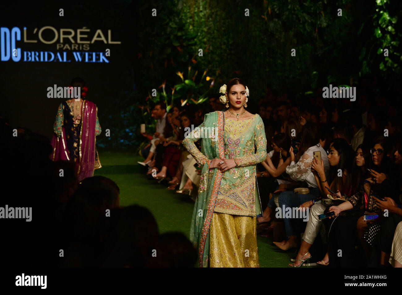 Lahore, Pakistan. 27th Sep, 2019. Models walks on ramp and presenting ...