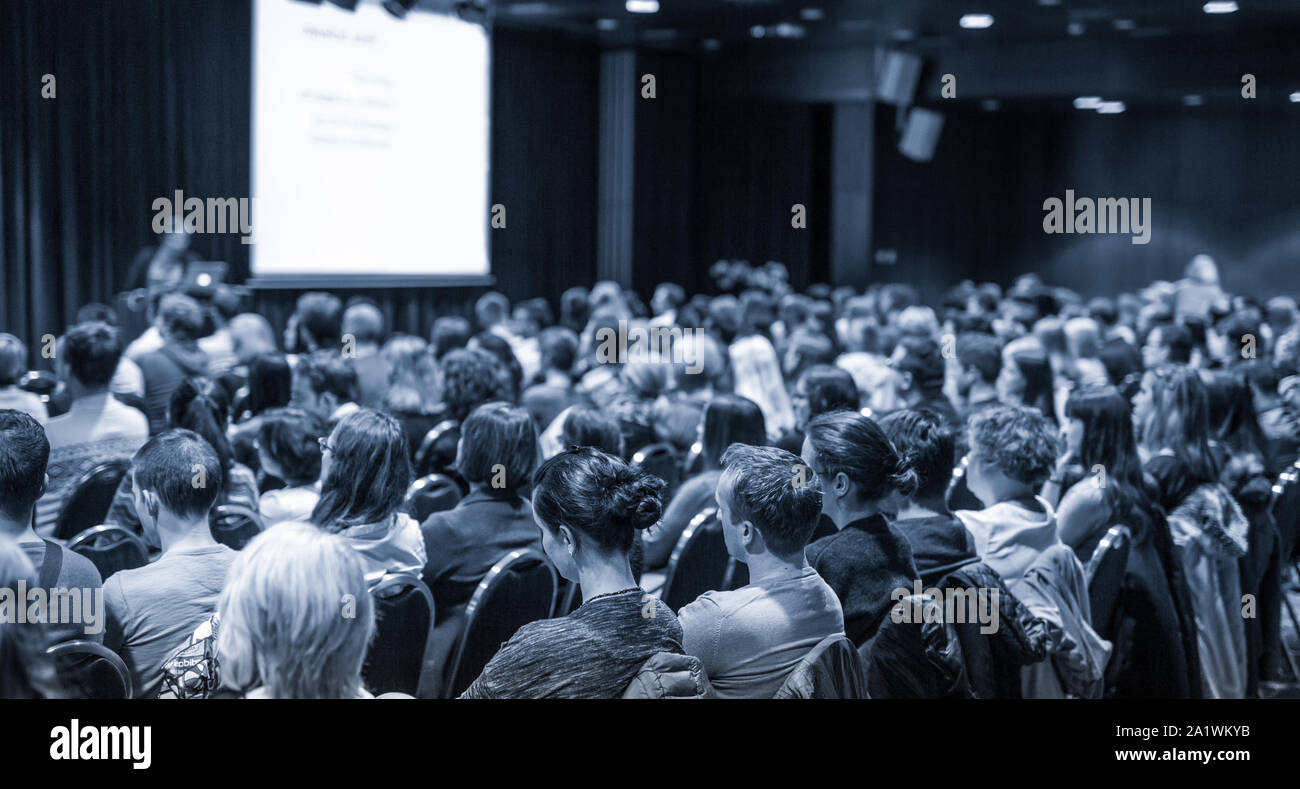 Audience in the lecture hall attending scientific business conference ...