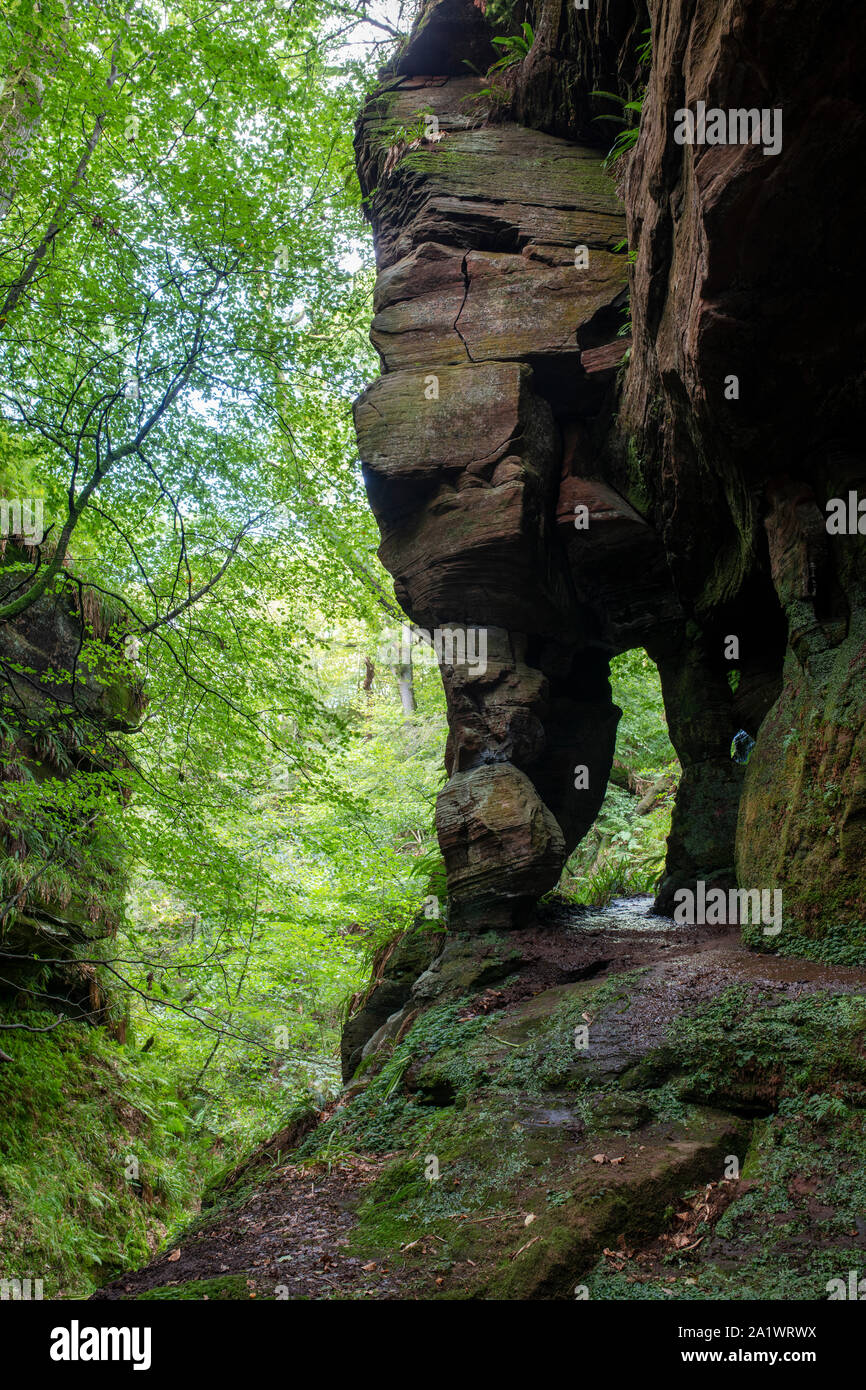 Stone arch in red sandstone at Crichope Linn. Near Gatelawbridge ...