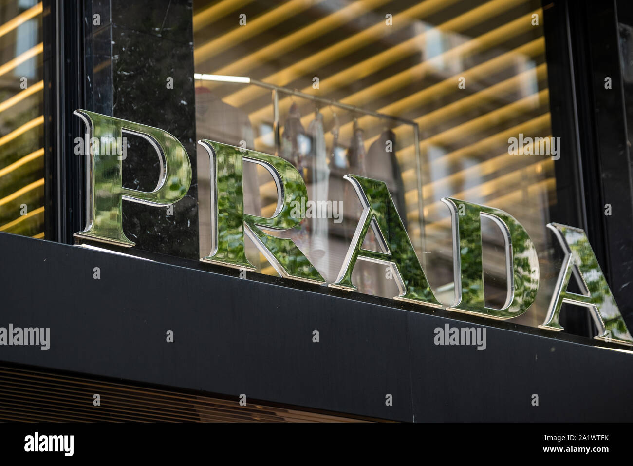 Prada logo at the brand store facade Stock Photo - Alamy