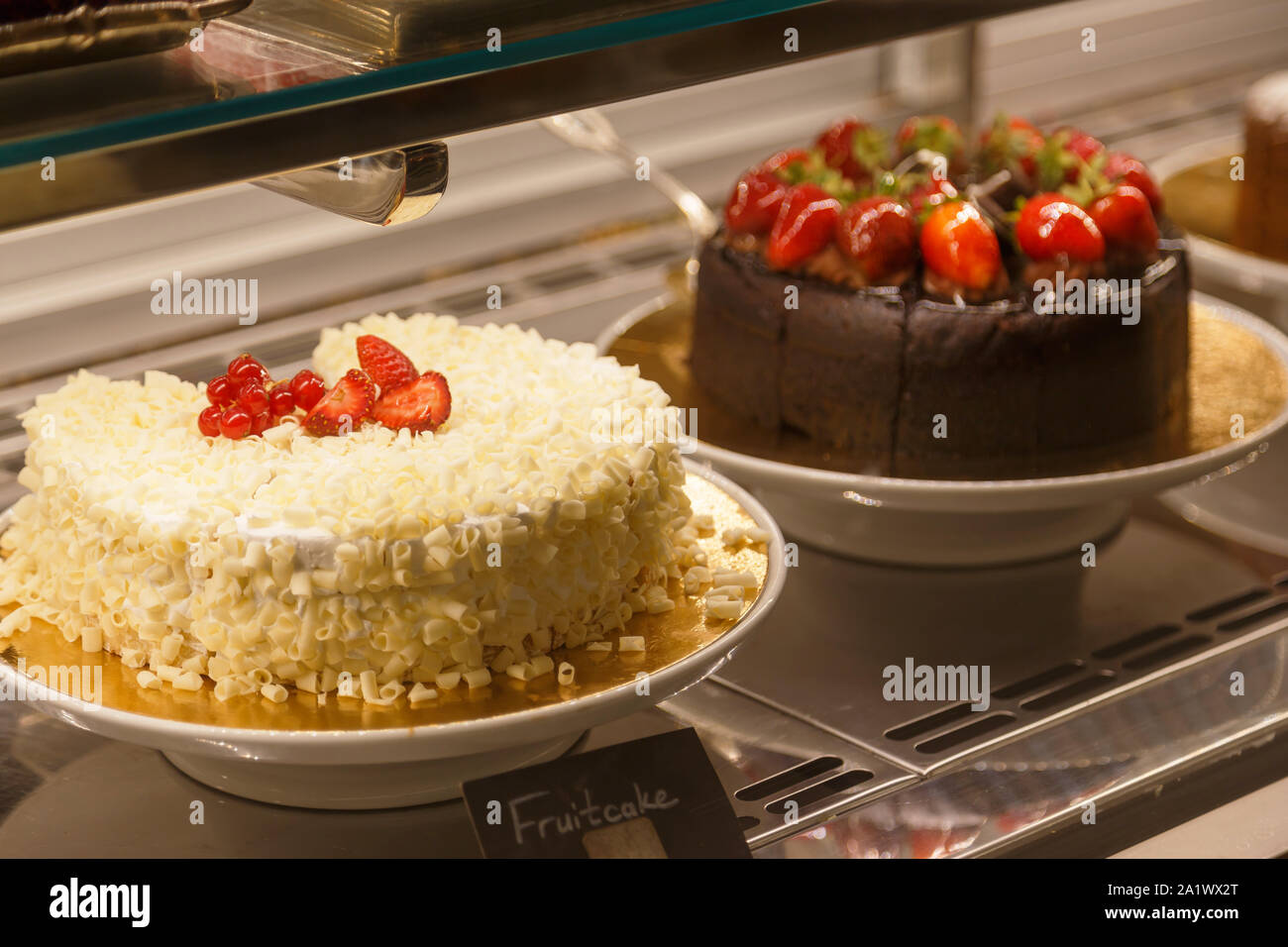 Display shelf of cakes hi-res stock photography and images - Alamy