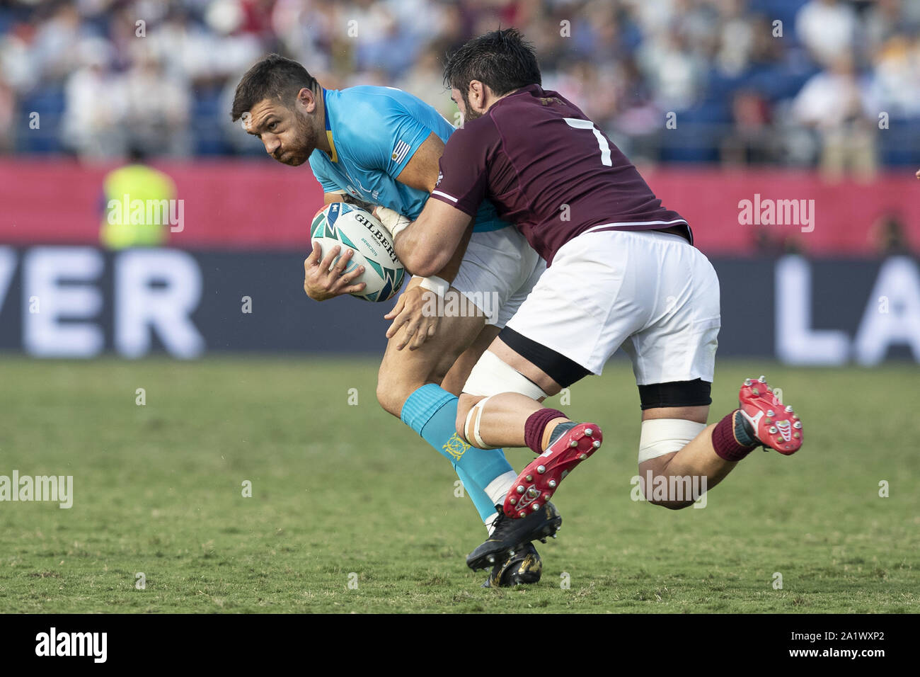 Saitama, Japan. 29th Sep, 2019. Uruguay's Agustin Ormaechea is tackled ...
