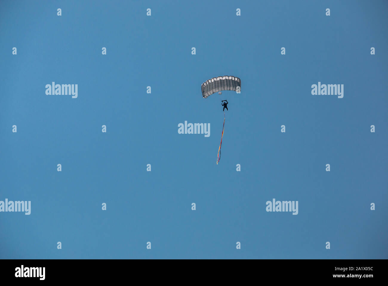 German skydiver in the air with German flag Stock Photo - Alamy