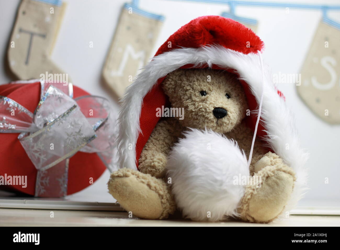 Teddy bear at Christmas time Stock Photo - Alamy