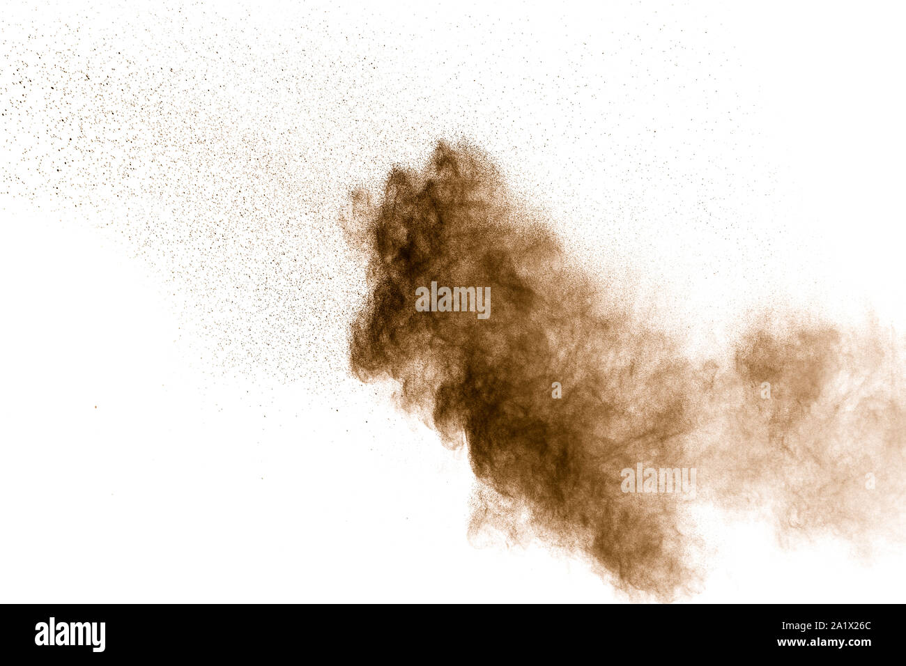 Stopping the movement of brown powder. Explosive brown powder on white ...
