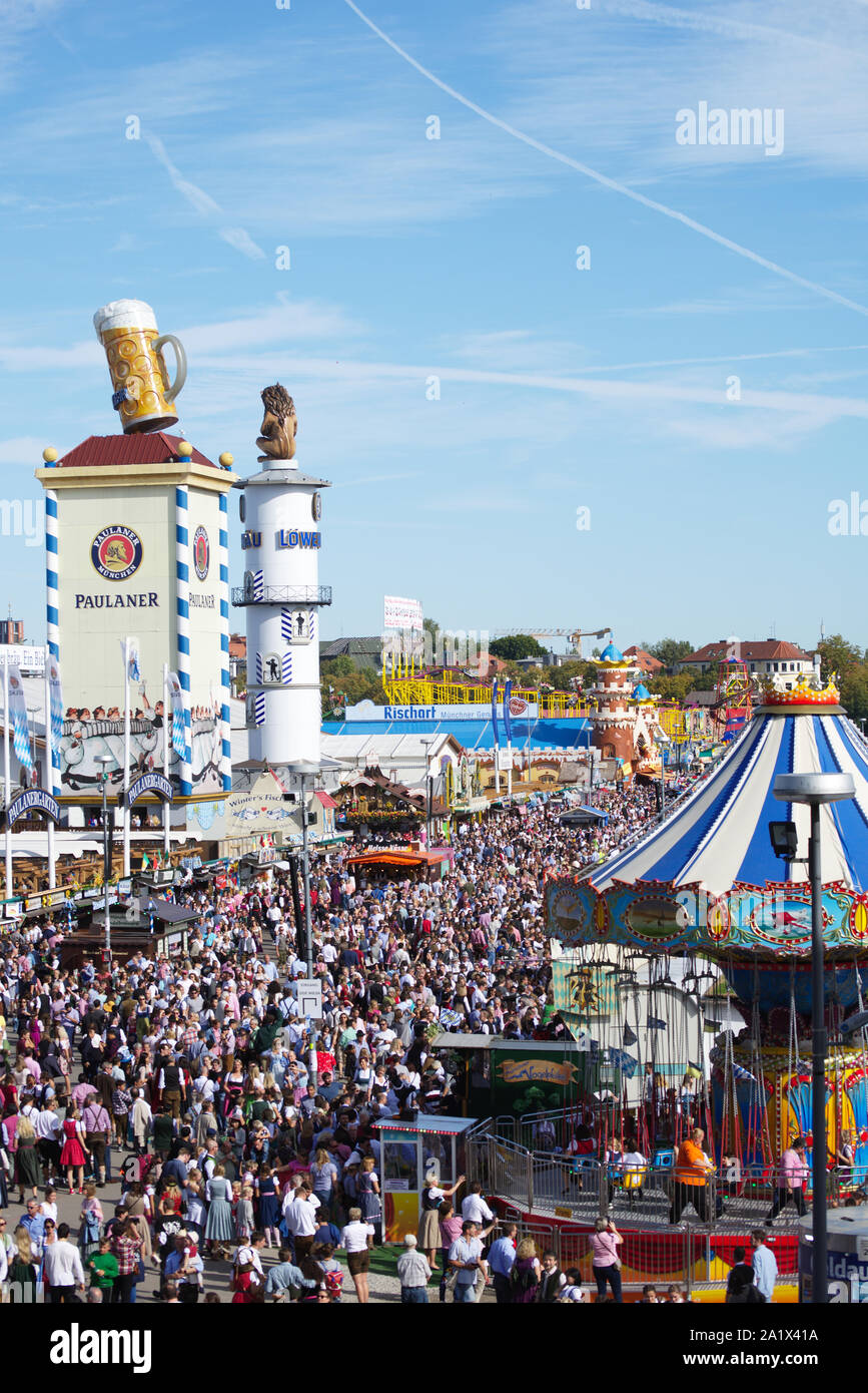 A large number of visitors strolling on a Sunday / weekend along one of ...