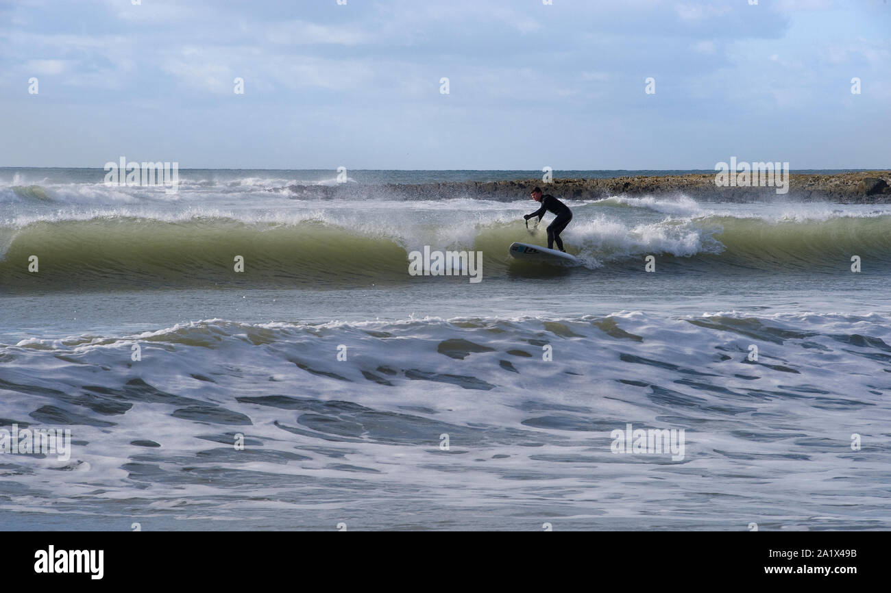 Winter surfing at Broad Beach on Anglesey Stock Photo - Alamy