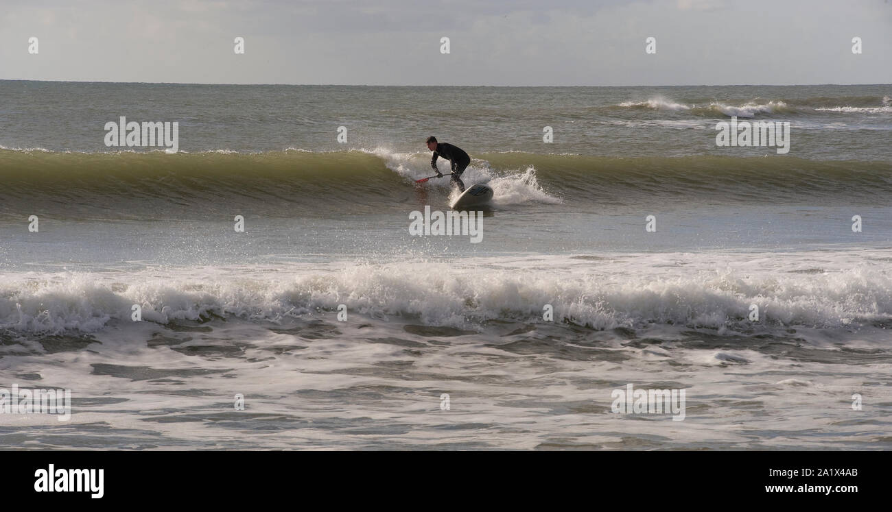 Winter surfing at Broad Beach on Anglesey Stock Photo - Alamy