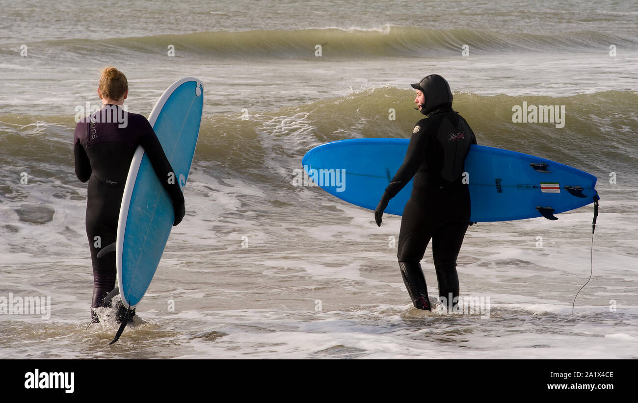 Winter surfing at Broad Beach on Anglesey Stock Photo - Alamy