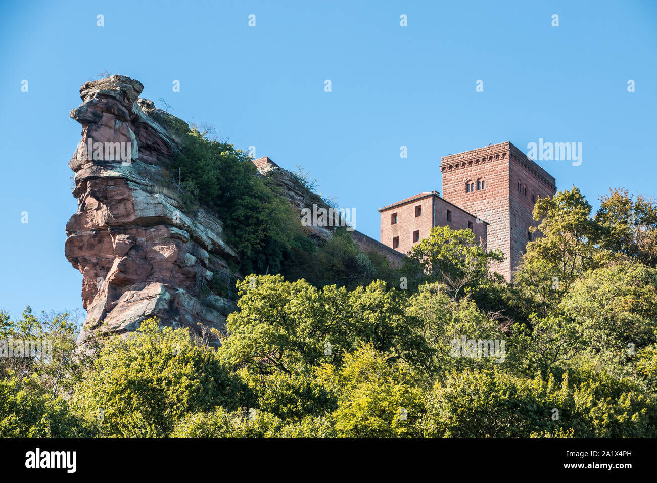 Big rocks, old castle and high tower made of sandstone Stock Photo - Alamy