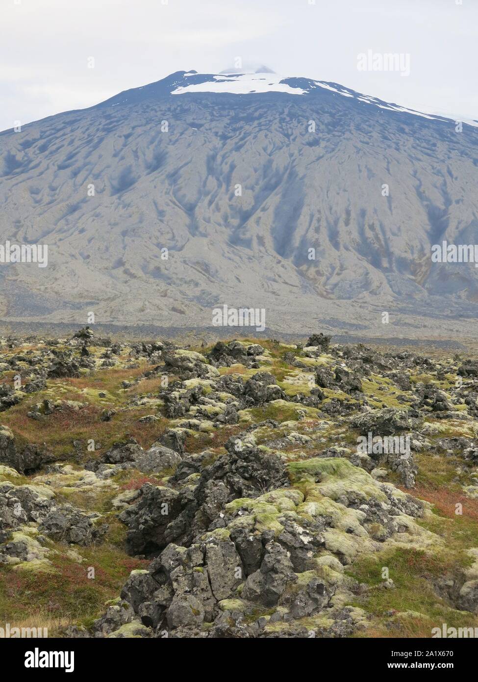 The high icecap tops the dormant volcano Snaefellsjokull, the setting ...