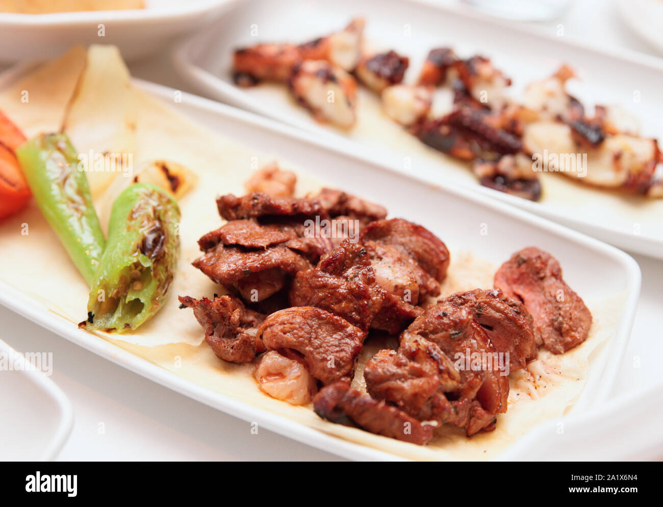 Meat kebab with grilled vegetables on plate Stock Photo - Alamy