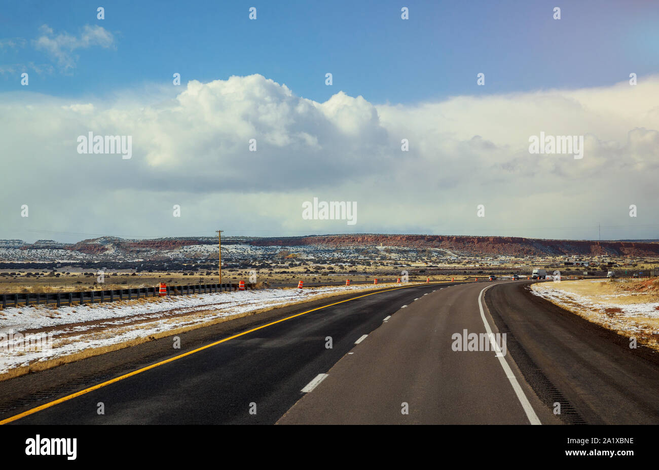 Dramatic crisp winter highway in winter snow covers the desert of ...