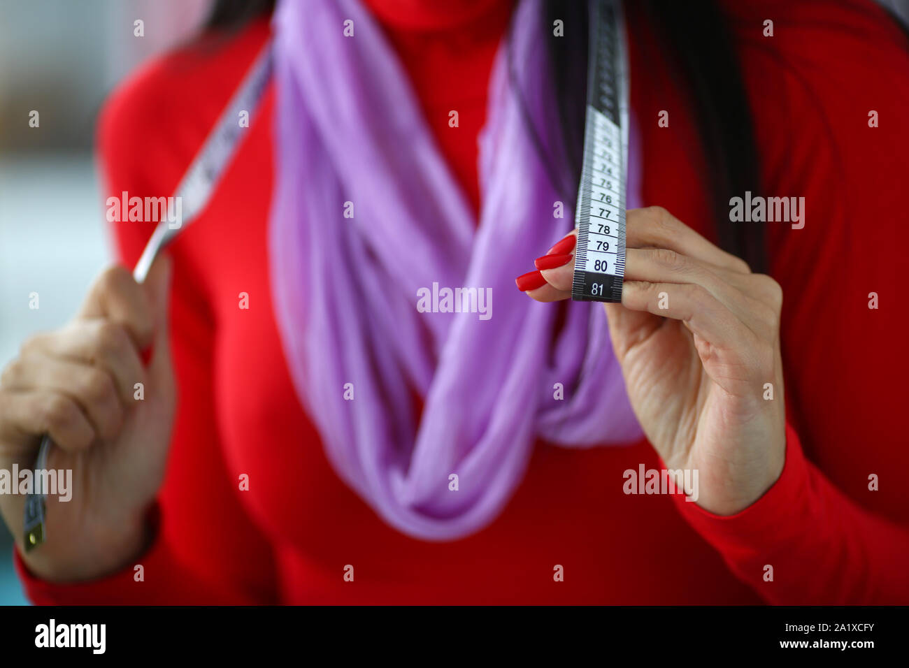 Arms of tailor Stock Photo - Alamy