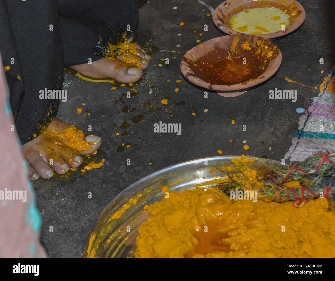 closeup shot of bride feet on haldi(turmeric) ceremony in one of the ...
