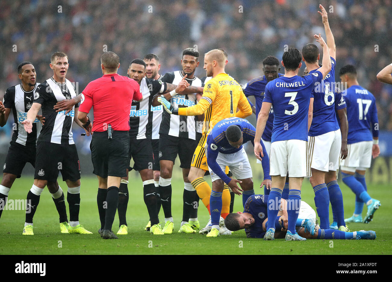 Newcastle United's Isaac Hayden (left) is sent off the pitch as his ...