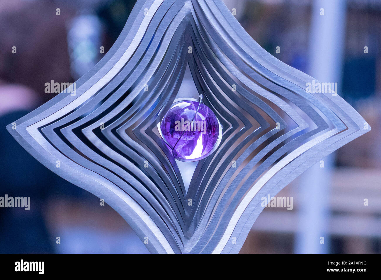 hypnotic rotating ball and metal gadget detail Stock Photo - Alamy