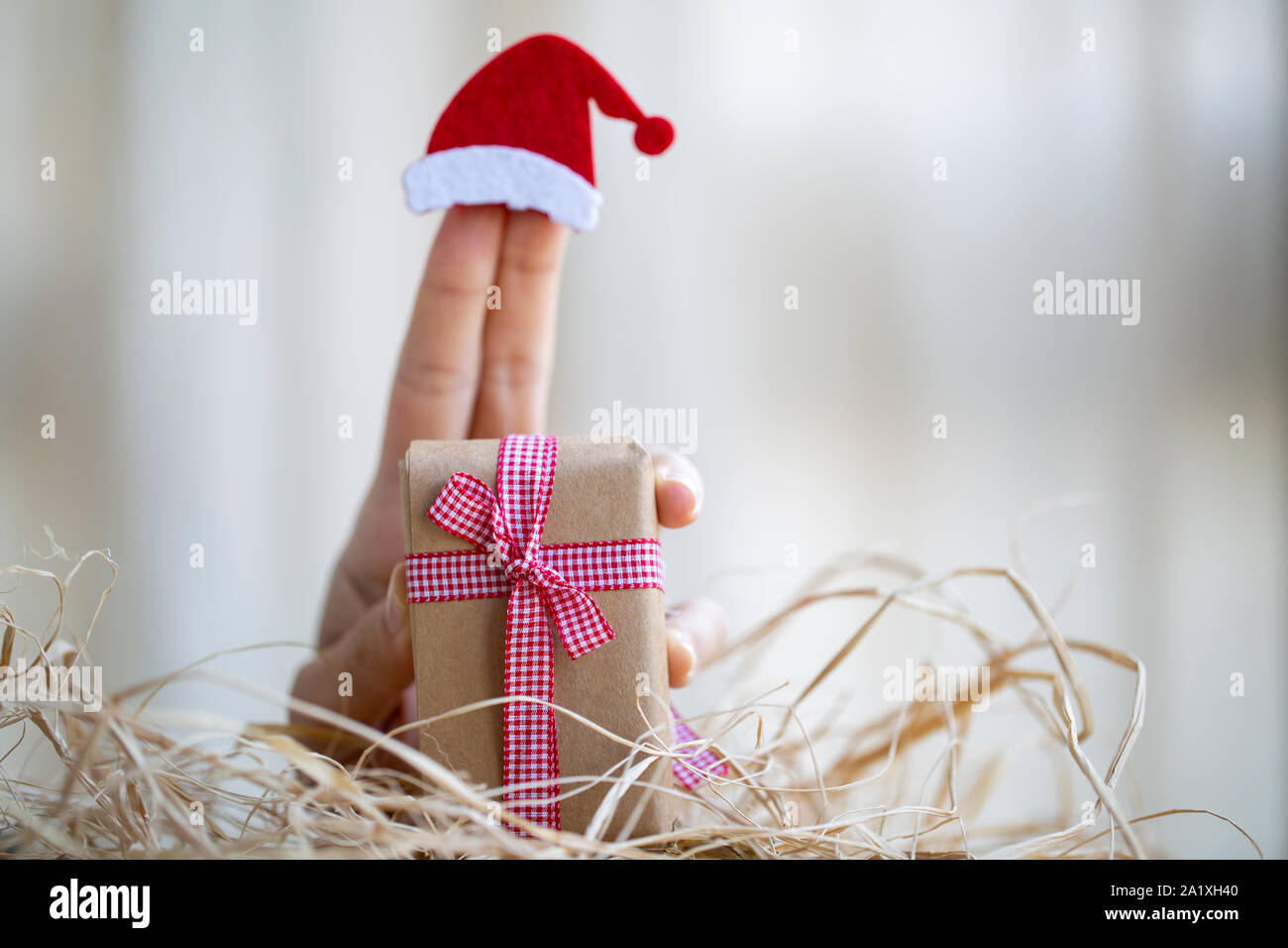 Closeup hands giving gift box Stock Photo - Alamy