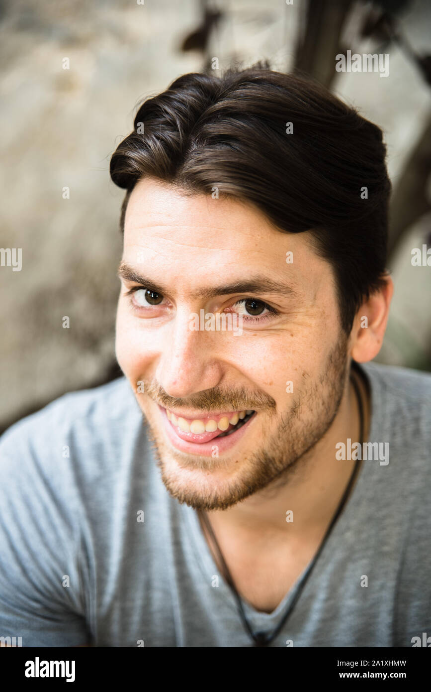 Funny male handsome model looking at camera Stock Photo - Alamy