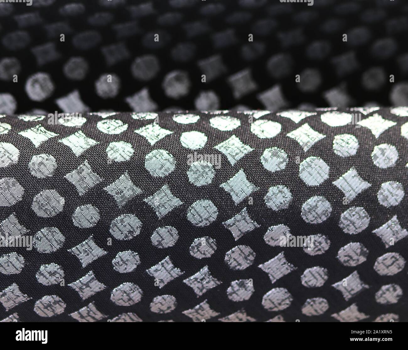 Colorful detailed fabric textures of different cloth types in a close ...