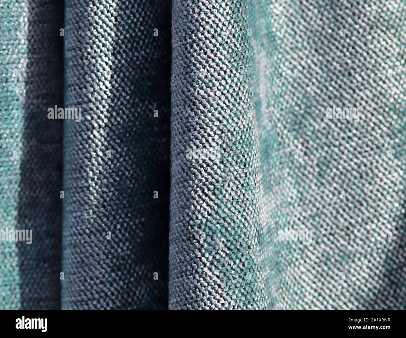 Colorful detailed fabric textures of different cloth types in a close ...