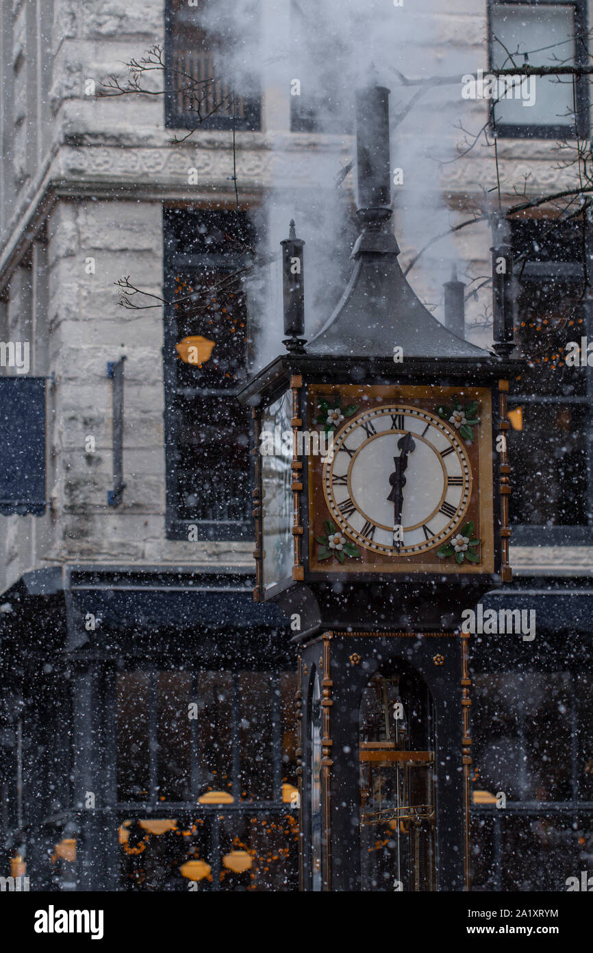 Steam clock in the snow Stock Photo - Alamy