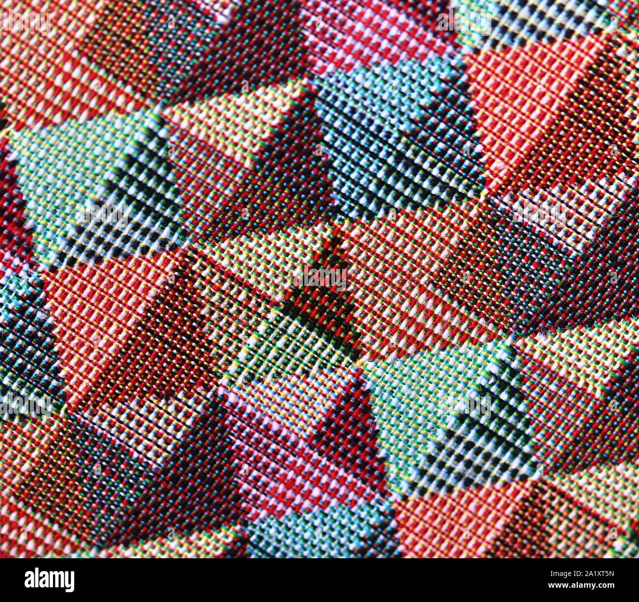 Colorful detailed fabric textures of different cloth types in a close ...