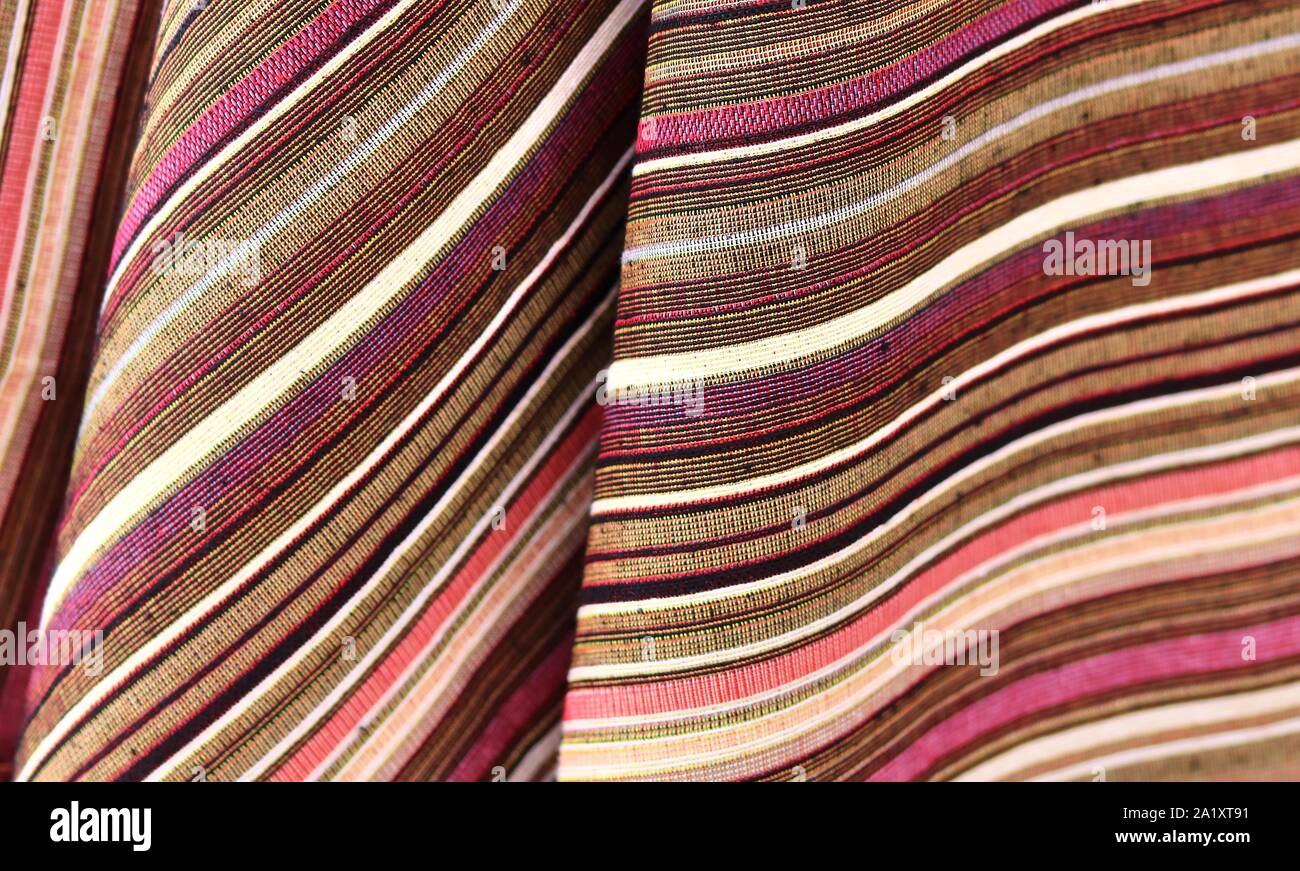 Colorful detailed fabric textures of different cloth types in a close ...