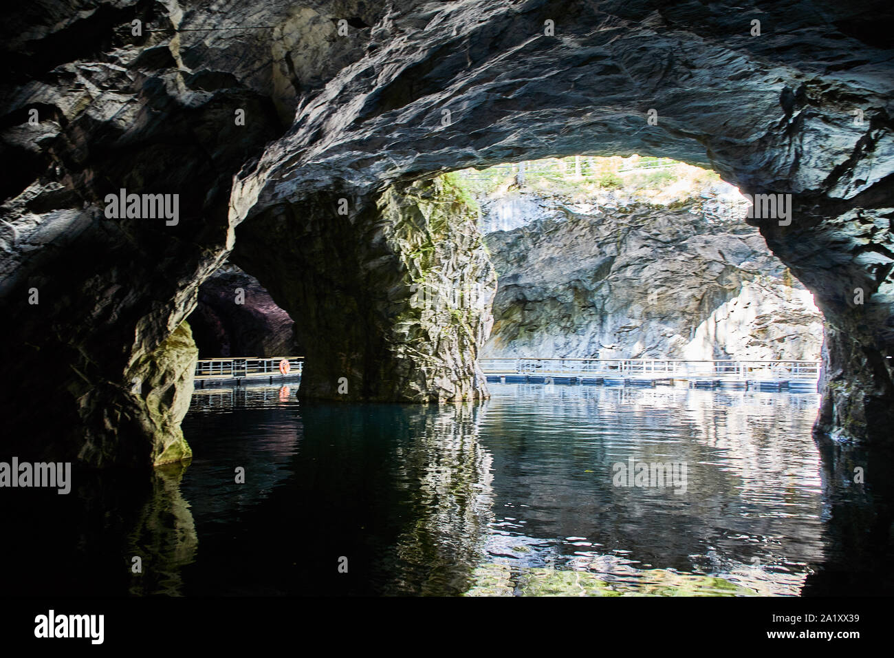 Types of a former underground marble quarry flooded with water. The ...