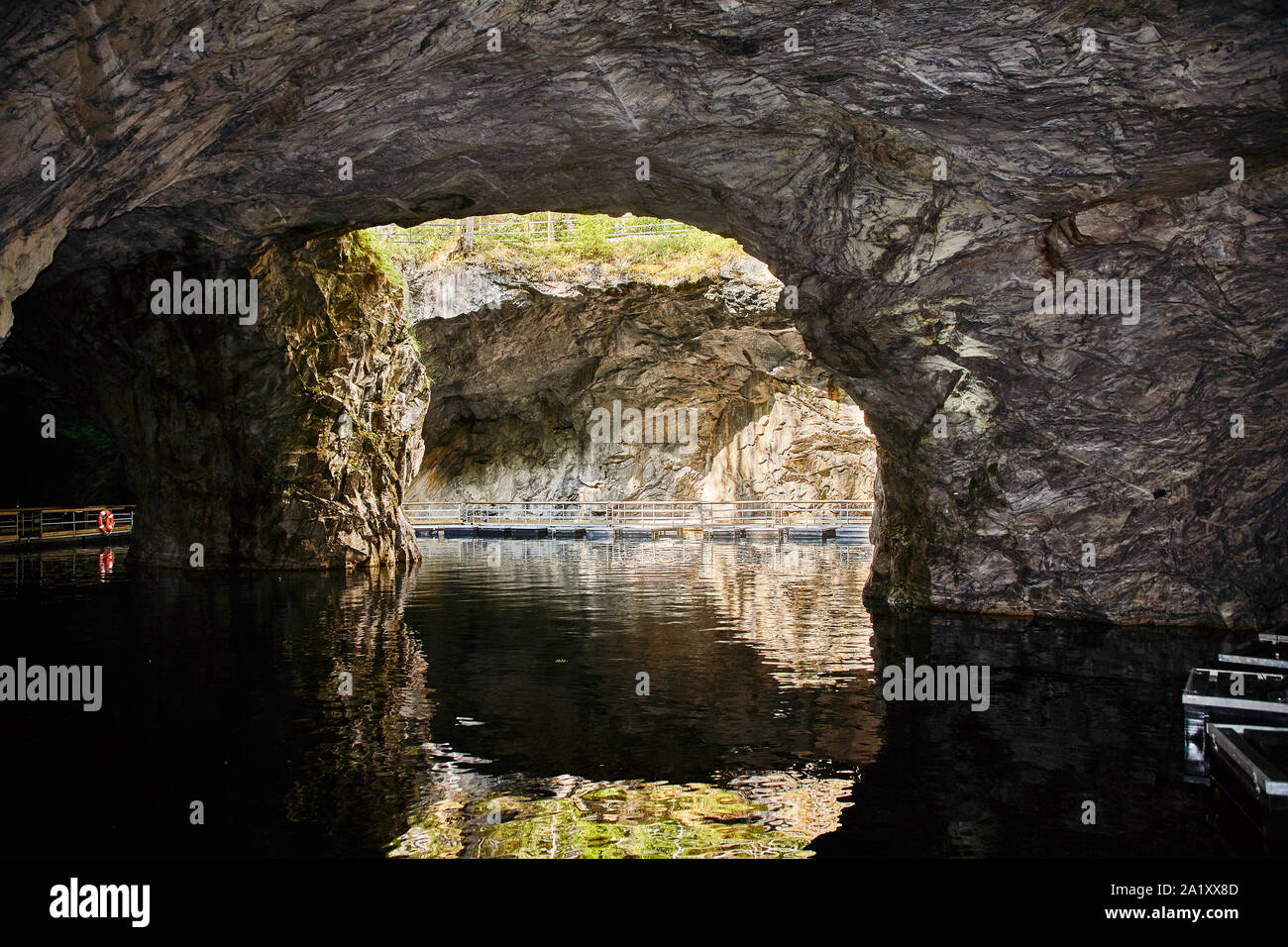 Types of a former underground marble quarry flooded with water. The ...