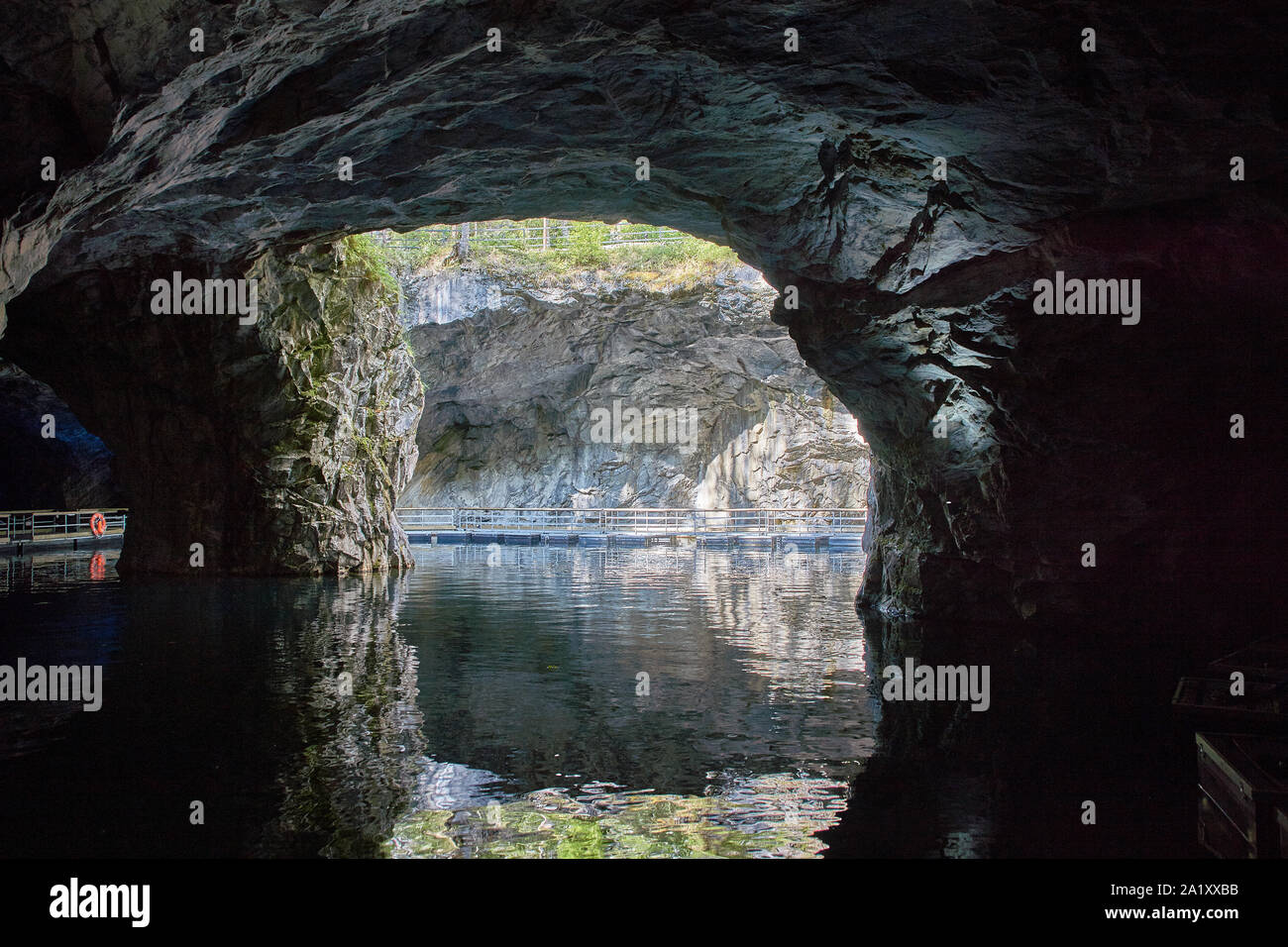 Types of a former underground marble quarry flooded with water. The ...