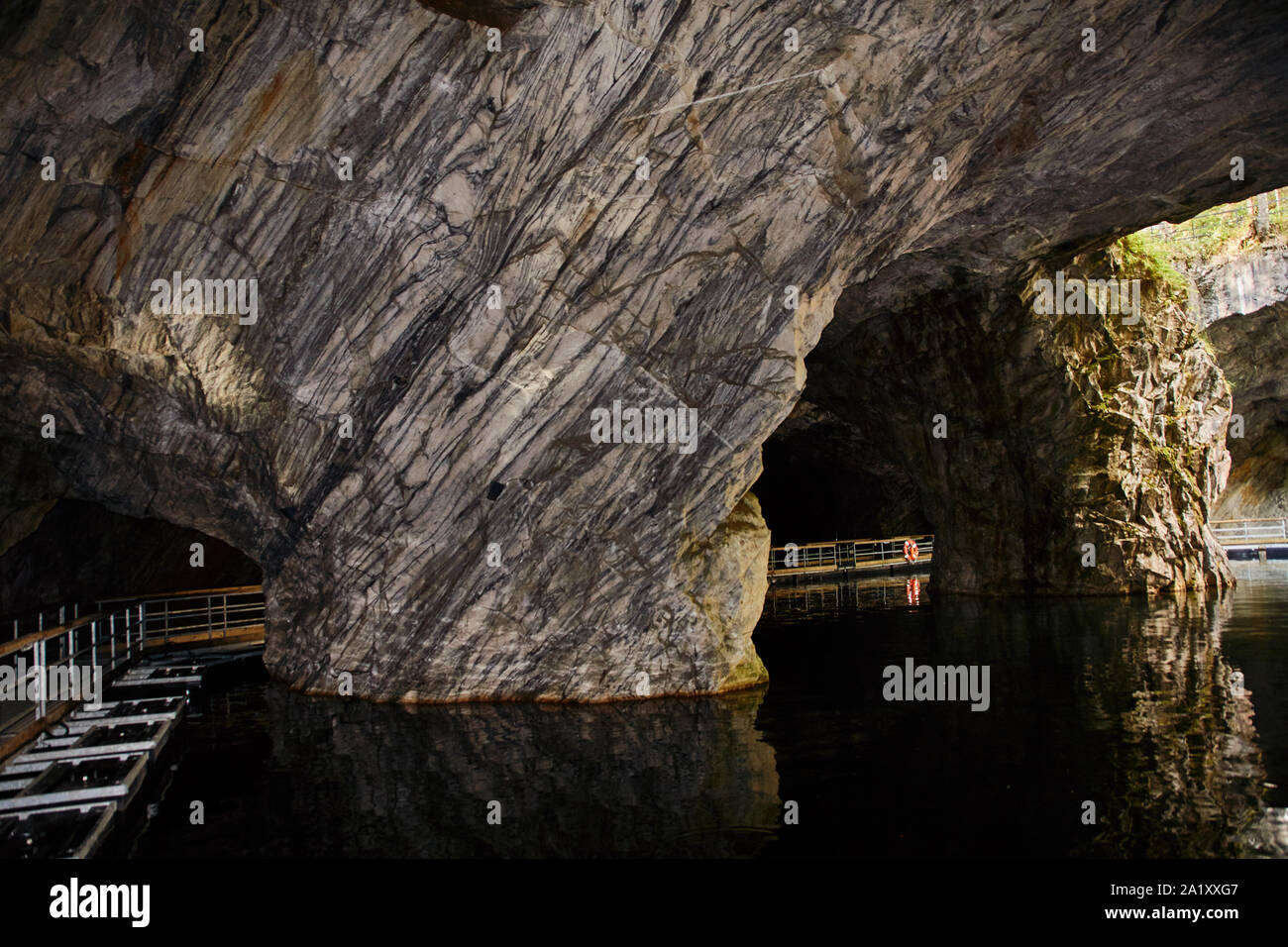 Types of a former underground marble quarry flooded with water. The ...