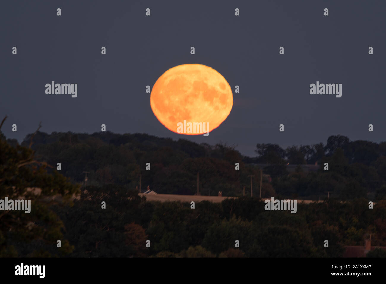 Full moon rising on Friday 13th Stock Photo - Alamy