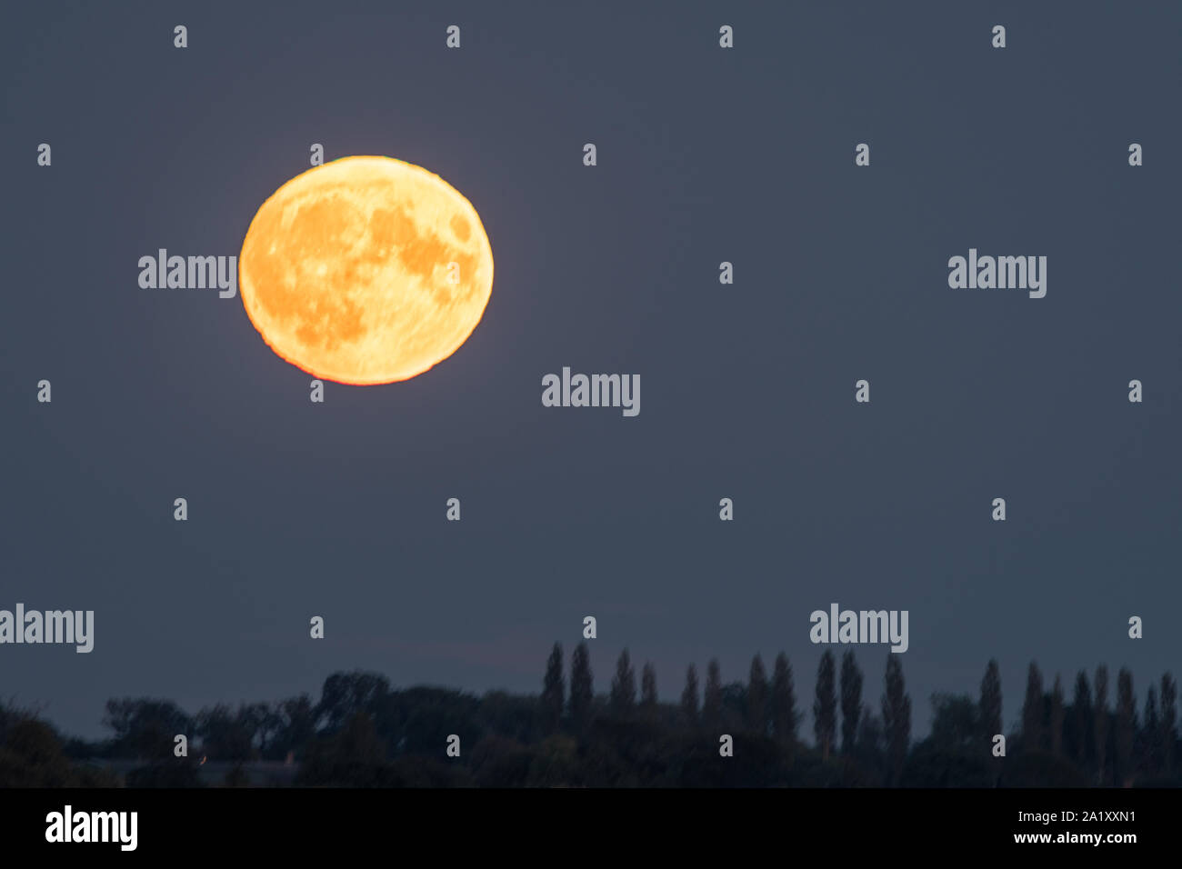 Full moon rising on Friday 13th Stock Photo - Alamy
