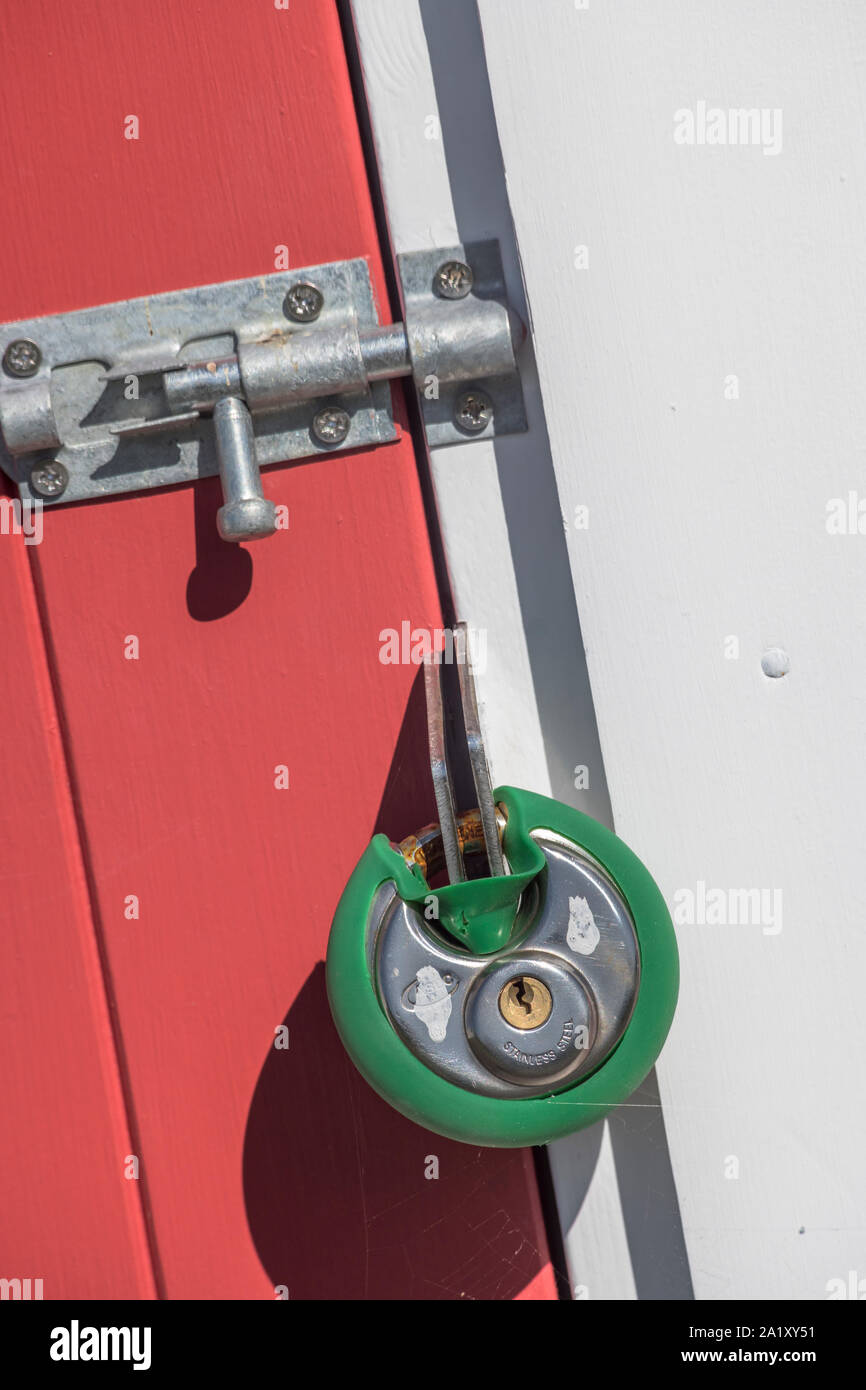 Close shot padlocked beach hut door @ Par Beach, Cornwall. Locked in ...