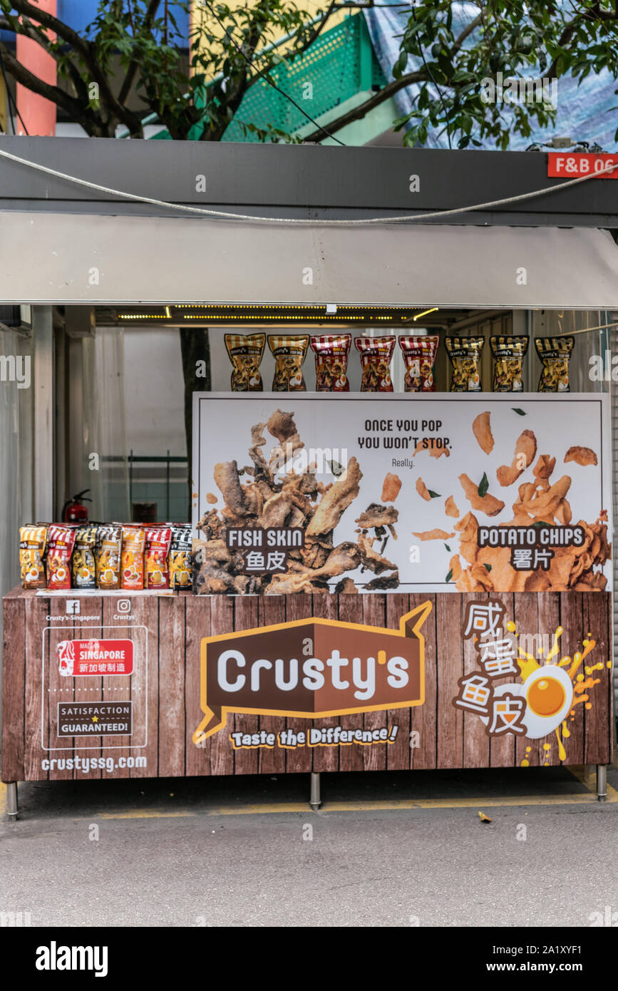 Singapore - March 22, 2019: Chinatown. Fish Skin and Potato chips booth ...