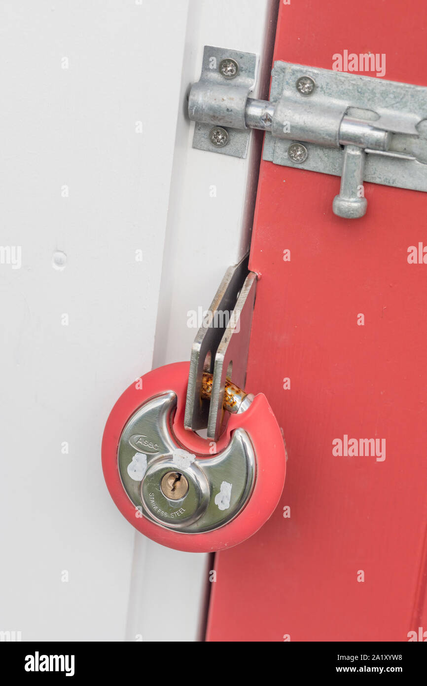 Close shot padlocked beach hut door @ Par Beach, Cornwall. Locked in ...