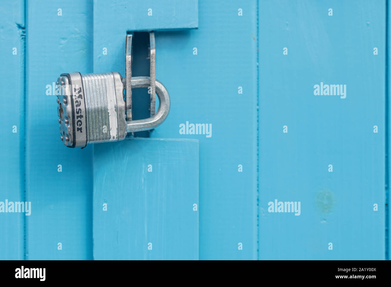 Close shot padlocked beach hut door @ Par Beach, Cornwall. Locked in ...