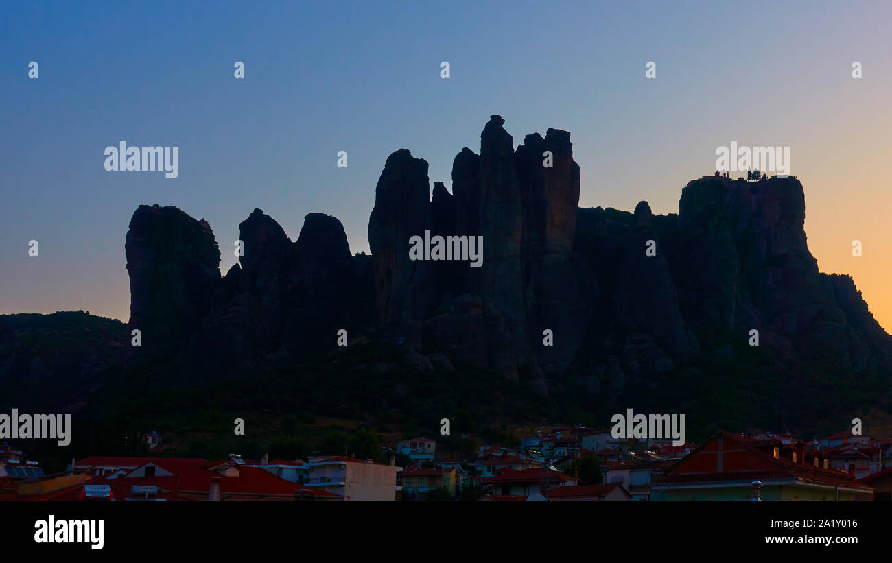 Colorful sky ana silhouette of The Merera rocks at dawn, Kalabaka ...