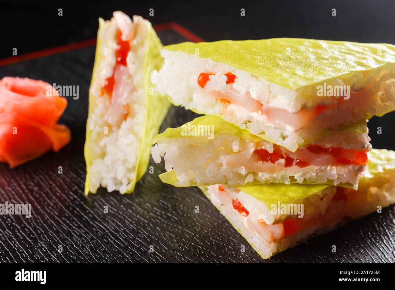 Triangular pieces. Japanese food, tasty of meal for lunch. Seafood ...