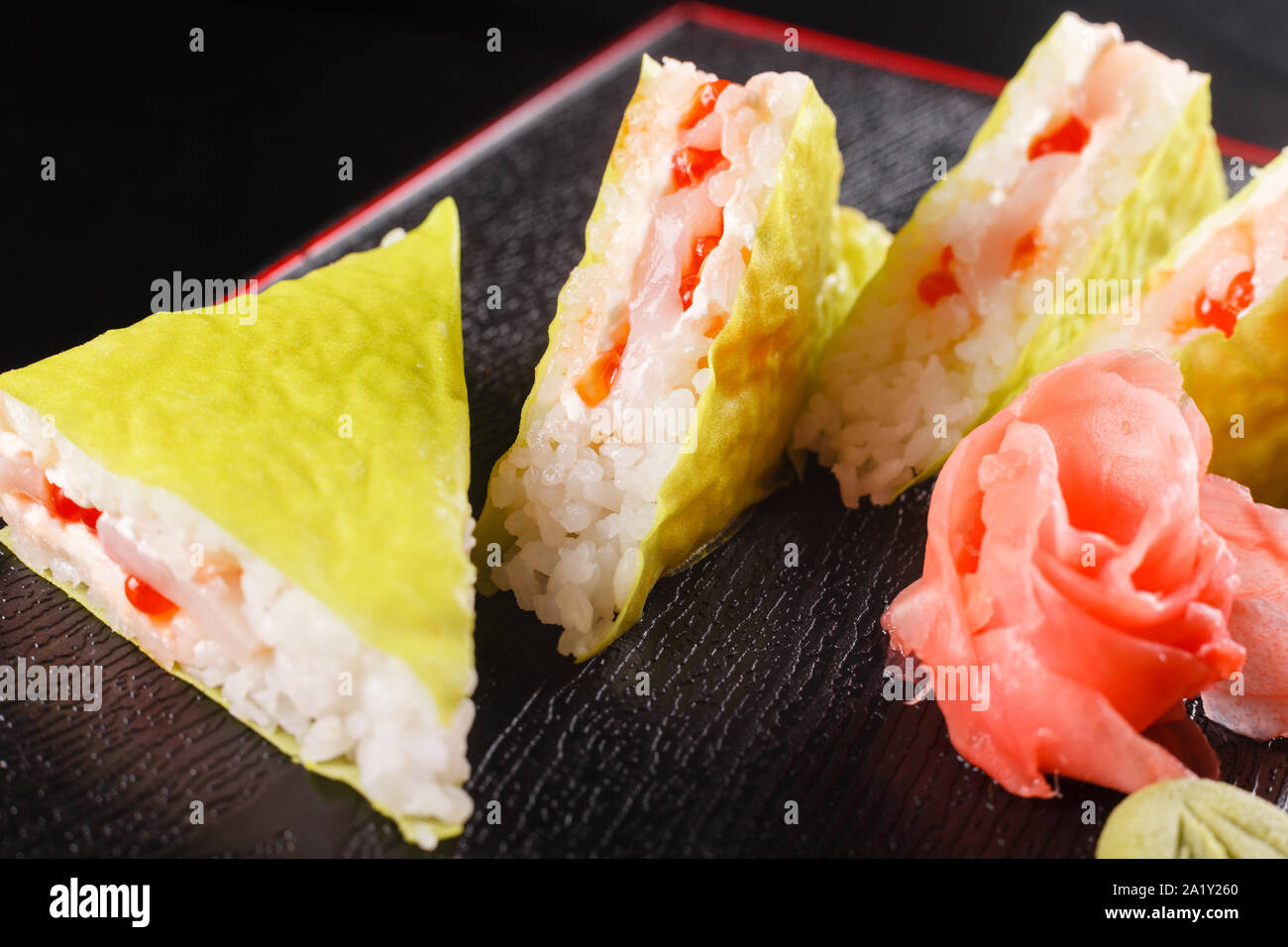 Triangular pieces. Japanese food, tasty of meal for lunch. Seafood ...